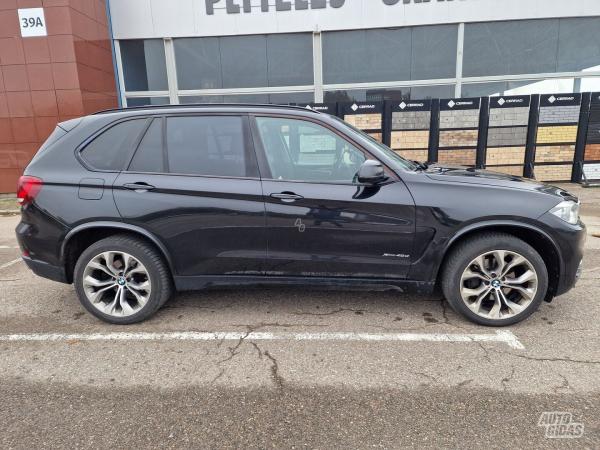 Black BMW X5 2014 in Klaipeda, with an engine capacity of 3.00 L and mileage of 339 thousand km for 14850 €, photo 5 on AUTOMOTO.COM.LV