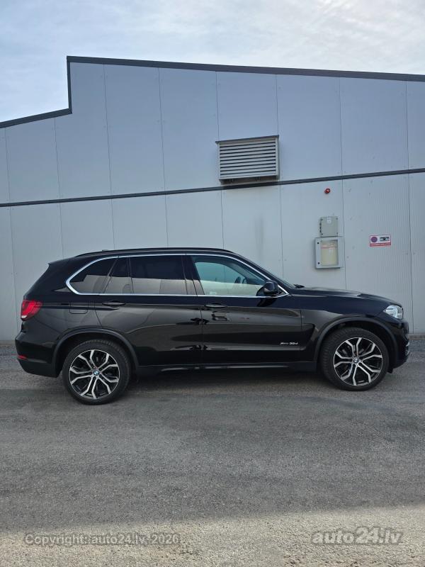 Melns BMW X5 2014 Pērnava, ar dzinēja tilpumu 3.00 L un nobraukumu 253 tūkst. km par 21900 €, foto 6 vietnē AUTOMOTO.COM.LV