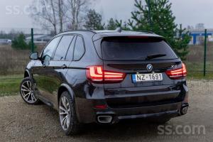 Black BMW X5 2014 in Riga, with an engine capacity of 3.00 L and mileage of 0 thousand km for 24290 €, photo 5 on AUTOMOTO.COM.LV
