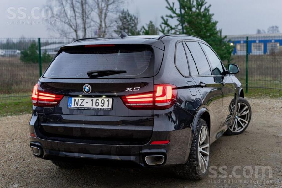 Black BMW X5 2014 in Riga, with an engine capacity of 3.00 L and mileage of 0 thousand km for 24290 €, photo 7 on AUTOMOTO.COM.LV