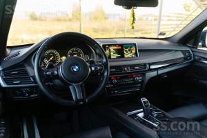 Black BMW X5 2014 in Riga, with an engine capacity of 3.00 L and mileage of 0 thousand km for 24290 €, photo 8 on AUTOMOTO.COM.LV