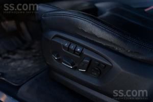 Black BMW X5 2014 in Riga, with an engine capacity of 3.00 L and mileage of 0 thousand km for 24290 €, photo 10 on AUTOMOTO.COM.LV
