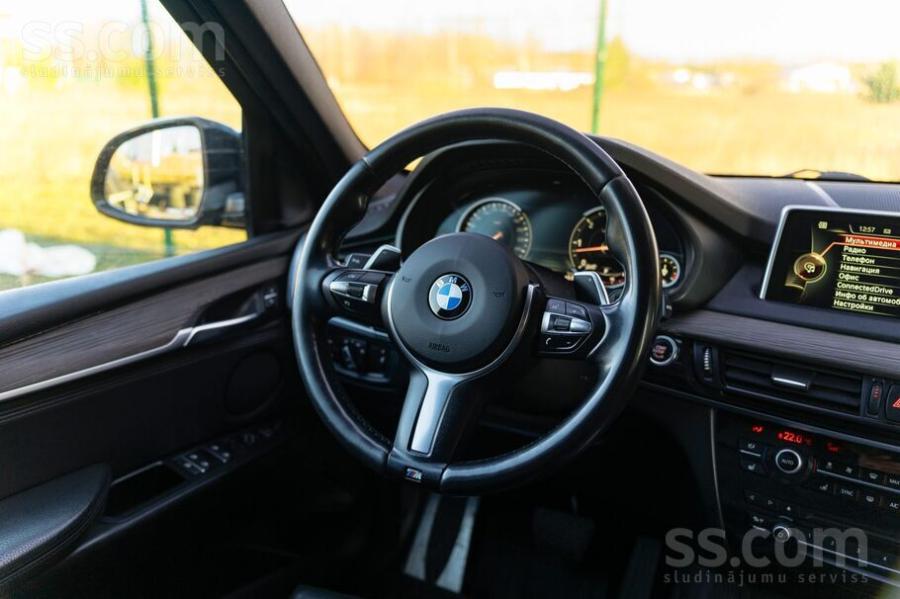 Black BMW X5 2014 in Riga, with an engine capacity of 3.00 L and mileage of 0 thousand km for 24290 €, photo 16 on AUTOMOTO.COM.LV