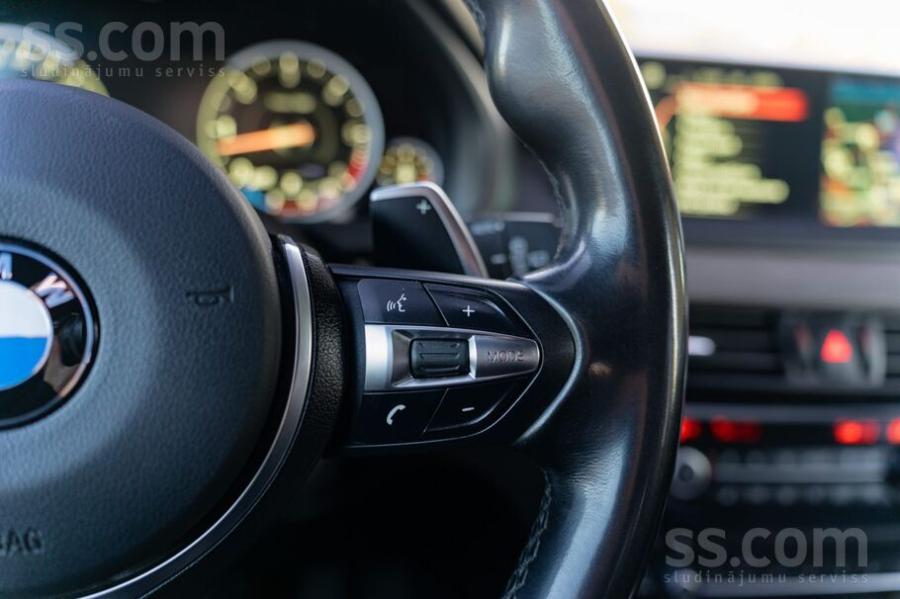 Black BMW X5 2014 in Riga, with an engine capacity of 3.00 L and mileage of 0 thousand km for 24290 €, photo 17 on AUTOMOTO.COM.LV