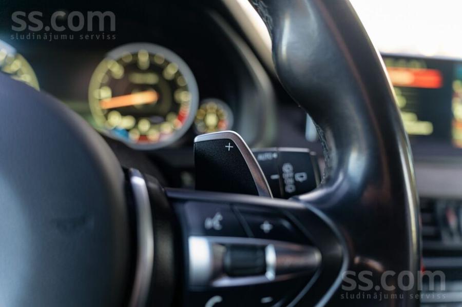 Black BMW X5 2014 in Riga, with an engine capacity of 3.00 L and mileage of 0 thousand km for 24290 €, photo 18 on AUTOMOTO.COM.LV