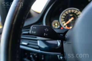 Black BMW X5 2014 in Riga, with an engine capacity of 3.00 L and mileage of 0 thousand km for 24290 €, photo 22 on AUTOMOTO.COM.LV