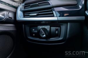 Black BMW X5 2014 in Riga, with an engine capacity of 3.00 L and mileage of 0 thousand km for 24290 €, photo 23 on AUTOMOTO.COM.LV