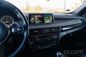 Black BMW X5 2014 in Riga, with an engine capacity of 3.00 L and mileage of 0 thousand km for 24290 €, photo 24 on AUTOMOTO.COM.LV