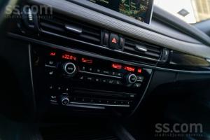 Black BMW X5 2014 in Riga, with an engine capacity of 3.00 L and mileage of 0 thousand km for 24290 €, photo 27 on AUTOMOTO.COM.LV
