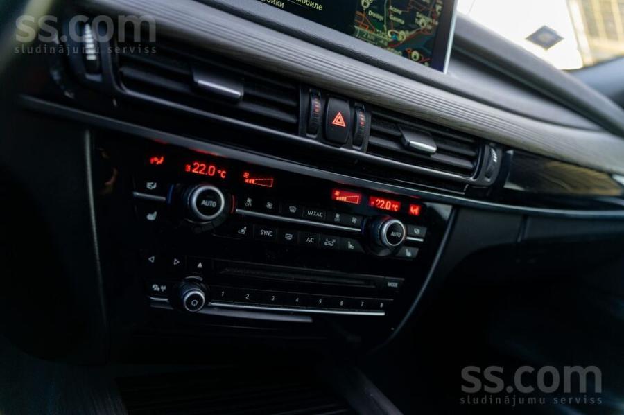 Black BMW X5 2014 in Riga, with an engine capacity of 3.00 L and mileage of 0 thousand km for 24290 €, photo 27 on AUTOMOTO.COM.LV