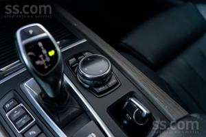 Black BMW X5 2014 in Riga, with an engine capacity of 3.00 L and mileage of 0 thousand km for 24290 €, photo 30 on AUTOMOTO.COM.LV