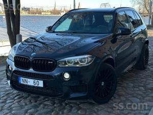 Black BMW X5 2014 in Riga, with an engine capacity of 3.00 L and mileage of 210 thousand km for 22700 €, photo  on AUTOMOTO.COM.LV