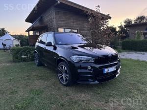 Black BMW X5 2014 in Ogre, with an engine capacity of 3.00 L and mileage of 246 thousand km for 26000 €, photo  on AUTOMOTO.COM.LV