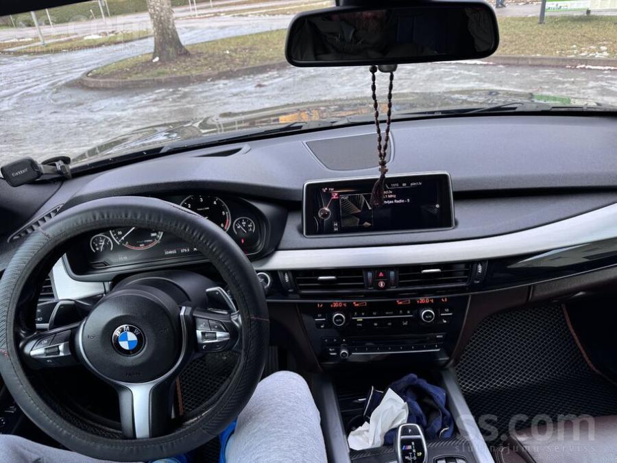 Melns BMW X5 2014 Ogre, ar dzinēja tilpumu 3.00 L un nobraukumu 246 tūkst. km par 26000 €, foto 4 vietnē AUTOMOTO.COM.LV