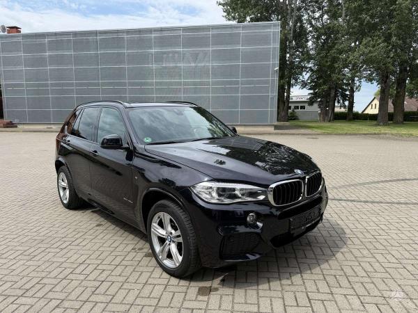 Black BMW X5 2014 in Marijampole, with an engine capacity of 2.99 L and mileage of 330 thousand km for 18800 €, photo 4 on AUTOMOTO.COM.LV