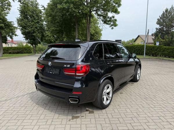 Black BMW X5 2014 in Marijampole, with an engine capacity of 2.99 L and mileage of 330 thousand km for 18800 €, photo 6 on AUTOMOTO.COM.LV