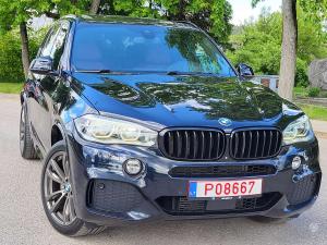 Black BMW X5 2014 in Vilnius, with an engine capacity of 2.99 L and mileage of 276 thousand km for 19850 €, photo 7 on AUTOMOTO.COM.LV