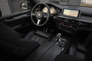 Black BMW X5 2014 in Jelgava, with an engine capacity of 3.00 L and mileage of 270 thousand km for 22450 €, photo 13 on AUTOMOTO.COM.LV