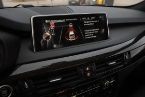 Black BMW X5 2014 in Jelgava, with an engine capacity of 3.00 L and mileage of 270 thousand km for 22450 €, photo 15 on AUTOMOTO.COM.LV