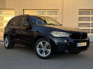 Black BMW X5 2014 in Riga, with an engine capacity of 3.00 L and mileage of 301 thousand km for 18900 €, photo 4 on AUTOMOTO.COM.LV