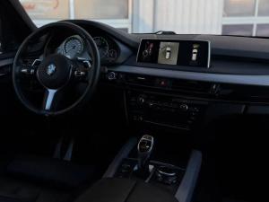 Black BMW X5 2014 in Riga, with an engine capacity of 3.00 L and mileage of 301 thousand km for 18900 €, photo 21 on AUTOMOTO.COM.LV