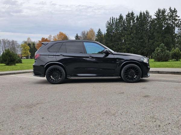Black BMW X5 2014 in Salcininkai, with an engine capacity of 2.99 L and mileage of 210 thousand km for 21850 €, photo 4 on AUTOMOTO.COM.LV