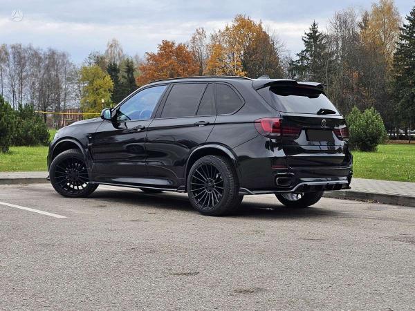 Black BMW X5 2014 in Salcininkai, with an engine capacity of 2.99 L and mileage of 210 thousand km for 21850 €, photo 6 on AUTOMOTO.COM.LV