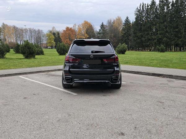 Black BMW X5 2014 in Salcininkai, with an engine capacity of 2.99 L and mileage of 210 thousand km for 21850 €, photo 8 on AUTOMOTO.COM.LV