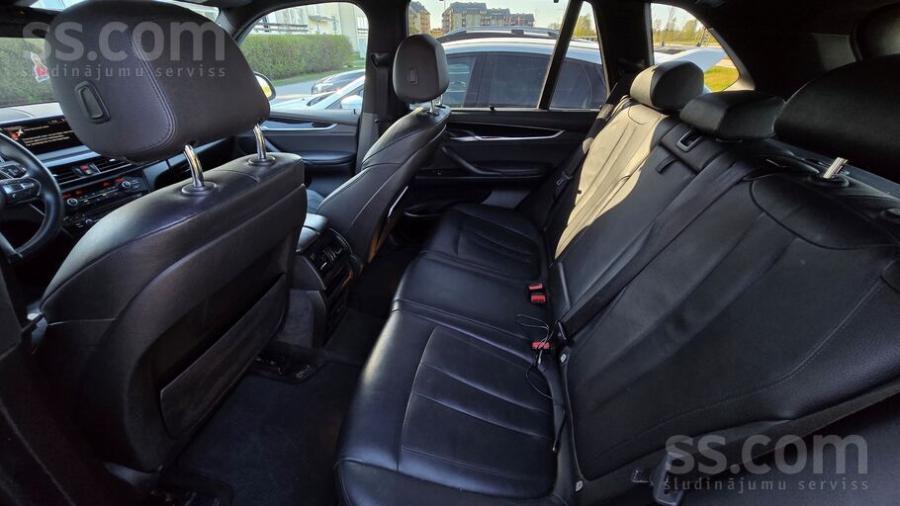 Black BMW X5 2014 in Riga, with an engine capacity of 3.00 L and mileage of 245 thousand km for 20000 €, photo 12 on AUTOMOTO.COM.LV