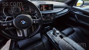 Black BMW X5 2014 in Riga, with an engine capacity of 3.00 L and mileage of 245 thousand km for 20000 €, photo 14 on AUTOMOTO.COM.LV