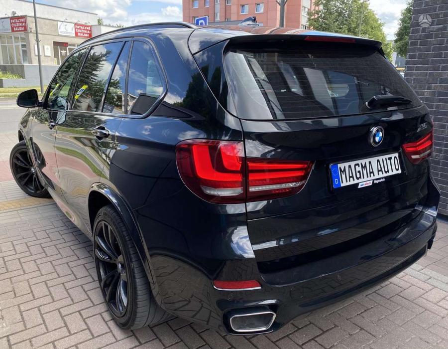 Black BMW X5 2014 in Marijampole, with an engine capacity of 2.99 L and mileage of 239 thousand km for 17499 €, photo 5 on AUTOMOTO.COM.LV
