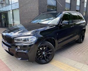 Black BMW X5 2014 in Marijampole, with an engine capacity of 2.99 L and mileage of 239 thousand km for 17499 €, photo 12 on AUTOMOTO.COM.LV