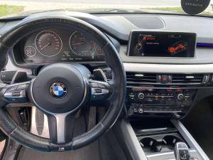 Black BMW X5 2014 in Marijampole, with an engine capacity of 2.99 L and mileage of 239 thousand km for 17499 €, photo 26 on AUTOMOTO.COM.LV