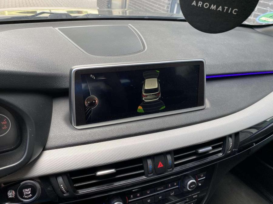 Black BMW X5 2014 in Marijampole, with an engine capacity of 2.99 L and mileage of 239 thousand km for 17499 €, photo 32 on AUTOMOTO.COM.LV