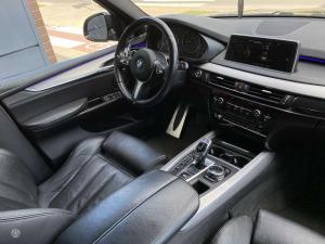 Black BMW X5 2014 in Marijampole, with an engine capacity of 2.99 L and mileage of 239 thousand km for 17499 €, photo 34 on AUTOMOTO.COM.LV