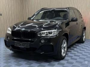 Black BMW X5 2014 in Marijampole, with an engine capacity of 2.99 L and mileage of 334 thousand km for 18750 €, photo 6 on AUTOMOTO.COM.LV