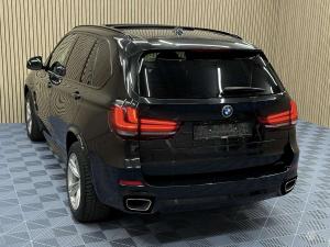 Black BMW X5 2014 in Marijampole, with an engine capacity of 2.99 L and mileage of 334 thousand km for 18750 €, photo 12 on AUTOMOTO.COM.LV