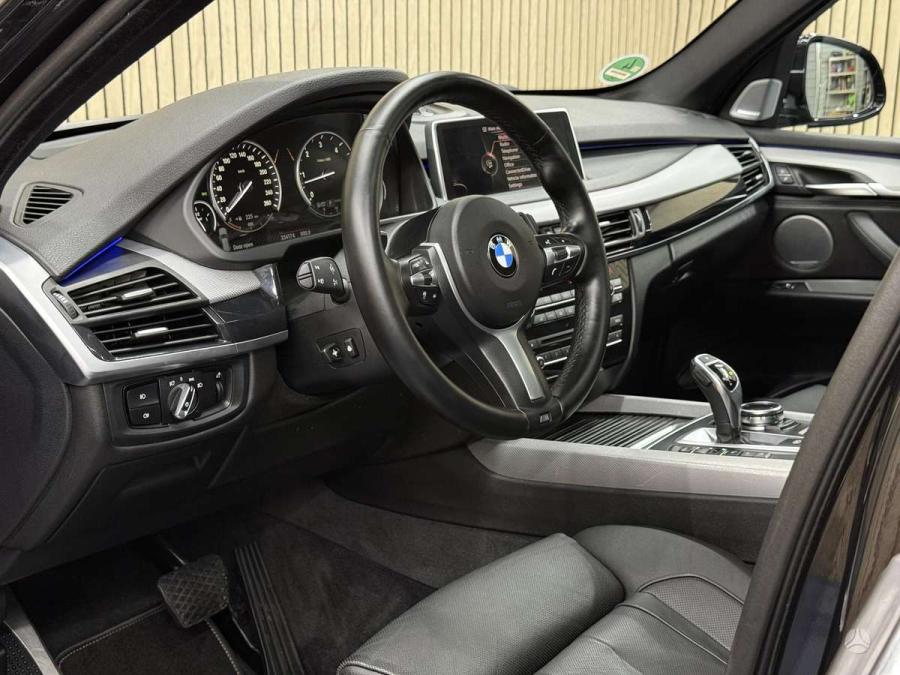 Black BMW X5 2014 in Marijampole, with an engine capacity of 2.99 L and mileage of 334 thousand km for 18750 €, photo 25 on AUTOMOTO.COM.LV