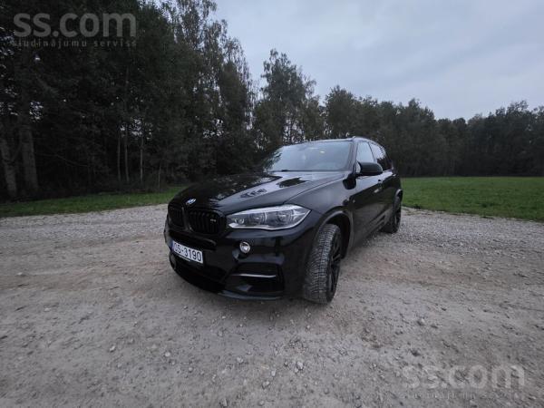 Black BMW X5 2014 in Riga, with an engine capacity of 3.00 L and mileage of 245 thousand km for 20950 €, photo 1 on AUTOMOTO.COM.LV