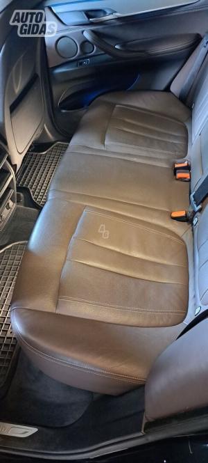 Black BMW X5 2014 in Kazlu Ruda, with an engine capacity of 3.00 L and mileage of 289 thousand km for 18500 €, photo 19 on AUTOMOTO.COM.LV