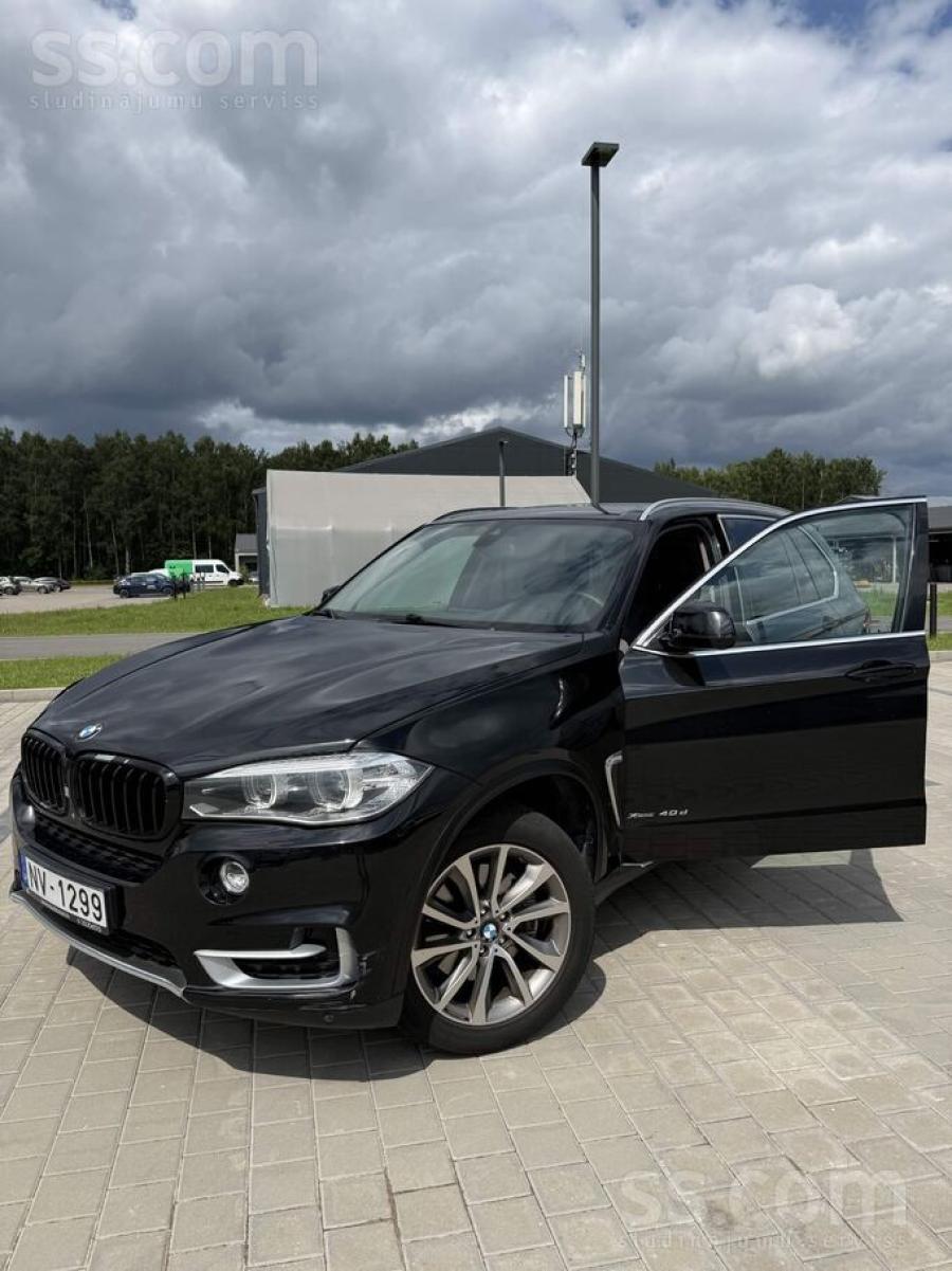 Black BMW X5 2014 in Riga, with an engine capacity of 3.00 L and mileage of 345 thousand km for 19000 €, photo 3 on AUTOMOTO.COM.LV