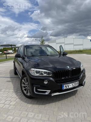 Black BMW X5 2014 in Riga, with an engine capacity of 3.00 L and mileage of 345 thousand km for 19000 €, photo 4 on AUTOMOTO.COM.LV
