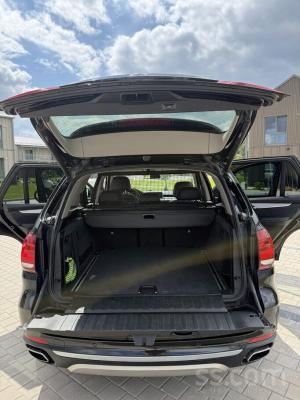 Black BMW X5 2014 in Riga, with an engine capacity of 3.00 L and mileage of 345 thousand km for 19000 €, photo 7 on AUTOMOTO.COM.LV