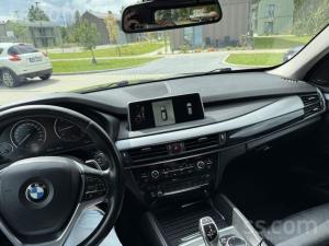 Black BMW X5 2014 in Riga, with an engine capacity of 3.00 L and mileage of 345 thousand km for 19000 €, photo 10 on AUTOMOTO.COM.LV