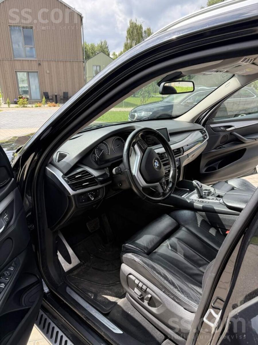 Black BMW X5 2014 in Riga, with an engine capacity of 3.00 L and mileage of 345 thousand km for 19000 €, photo 11 on AUTOMOTO.COM.LV