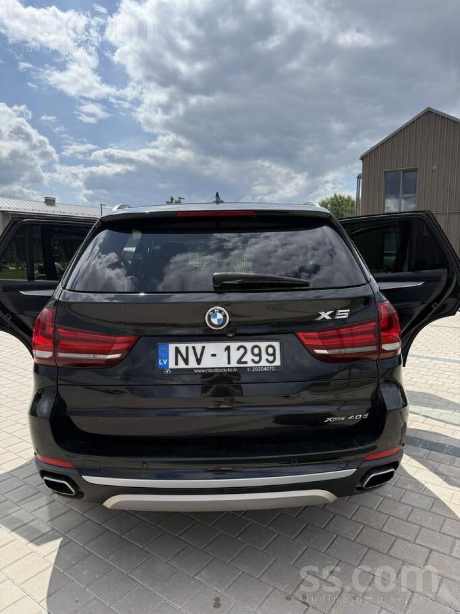 Black BMW X5 2014 in Riga, with an engine capacity of 3.00 L and mileage of 345 thousand km for 19000 €, photo 13 on AUTOMOTO.COM.LV