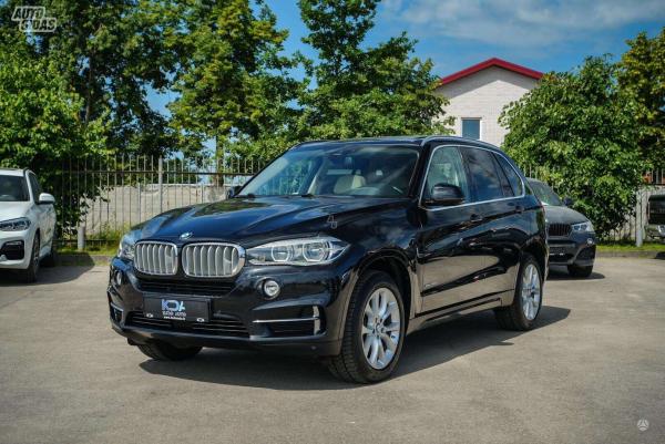 Black BMW X5 2014 in Kaunas, with an engine capacity of 3.00 L and mileage of 338 thousand km for 15950 €, photo 5 on AUTOMOTO.COM.LV