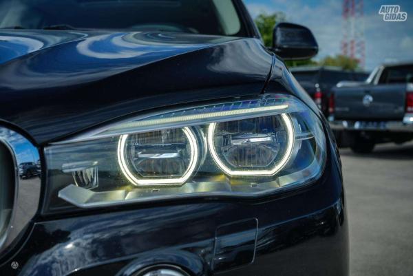 Black BMW X5 2014 in Kaunas, with an engine capacity of 3.00 L and mileage of 338 thousand km for 15950 €, photo 7 on AUTOMOTO.COM.LV