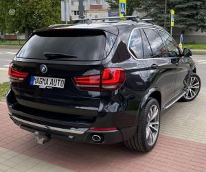 Black BMW X5 2014 in Marijampole, with an engine capacity of 2.99 L and mileage of 215 thousand km for 16850 €, photo 5 on AUTOMOTO.COM.LV