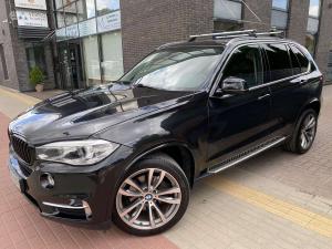 Black BMW X5 2014 in Marijampole, with an engine capacity of 2.99 L and mileage of 215 thousand km for 16850 €, photo 7 on AUTOMOTO.COM.LV